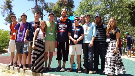 Former UConn Basketball Star Doron Sheffer poses with students at